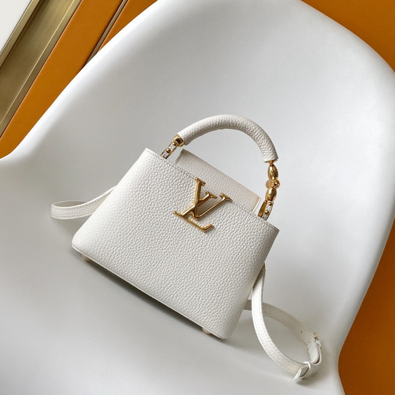 CAPUCINES EAST-WEST MINI 21 IN WHITE TAURILLON LEATHER GOLD-TONE HARDW ...